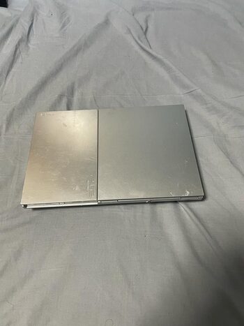 Comprar PS2 SUPERSLIM PLATEADA HDMI CON CABLES, MANDO Y JUEGO DE REGALO